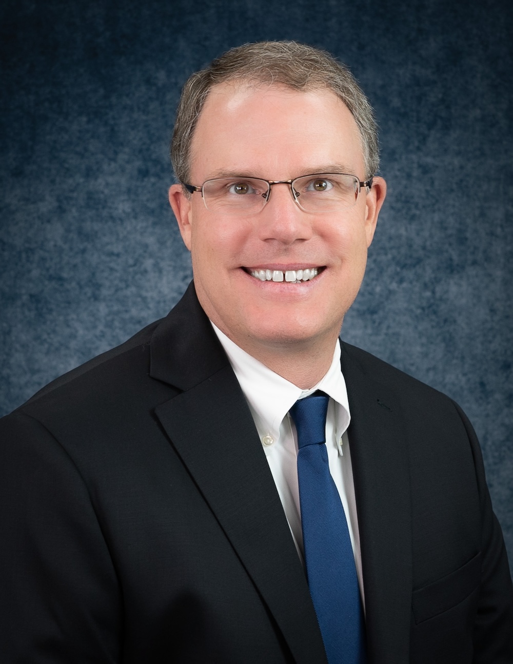 Lee Holland promoted to president of Freedom Real Estate & Capital